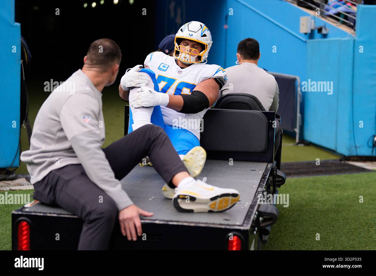 Los Angeles Chargers offensive tackle Joe Alt (76) is carted off the ...