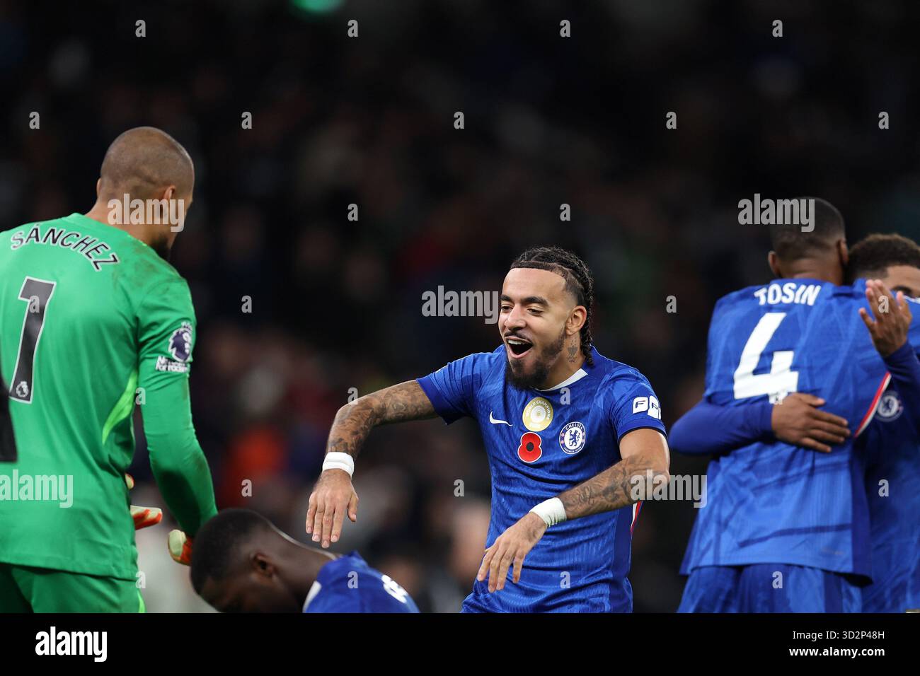 Malo Gusto of Chelsea (27) celebrates with teammate Robert Sanchez of ...