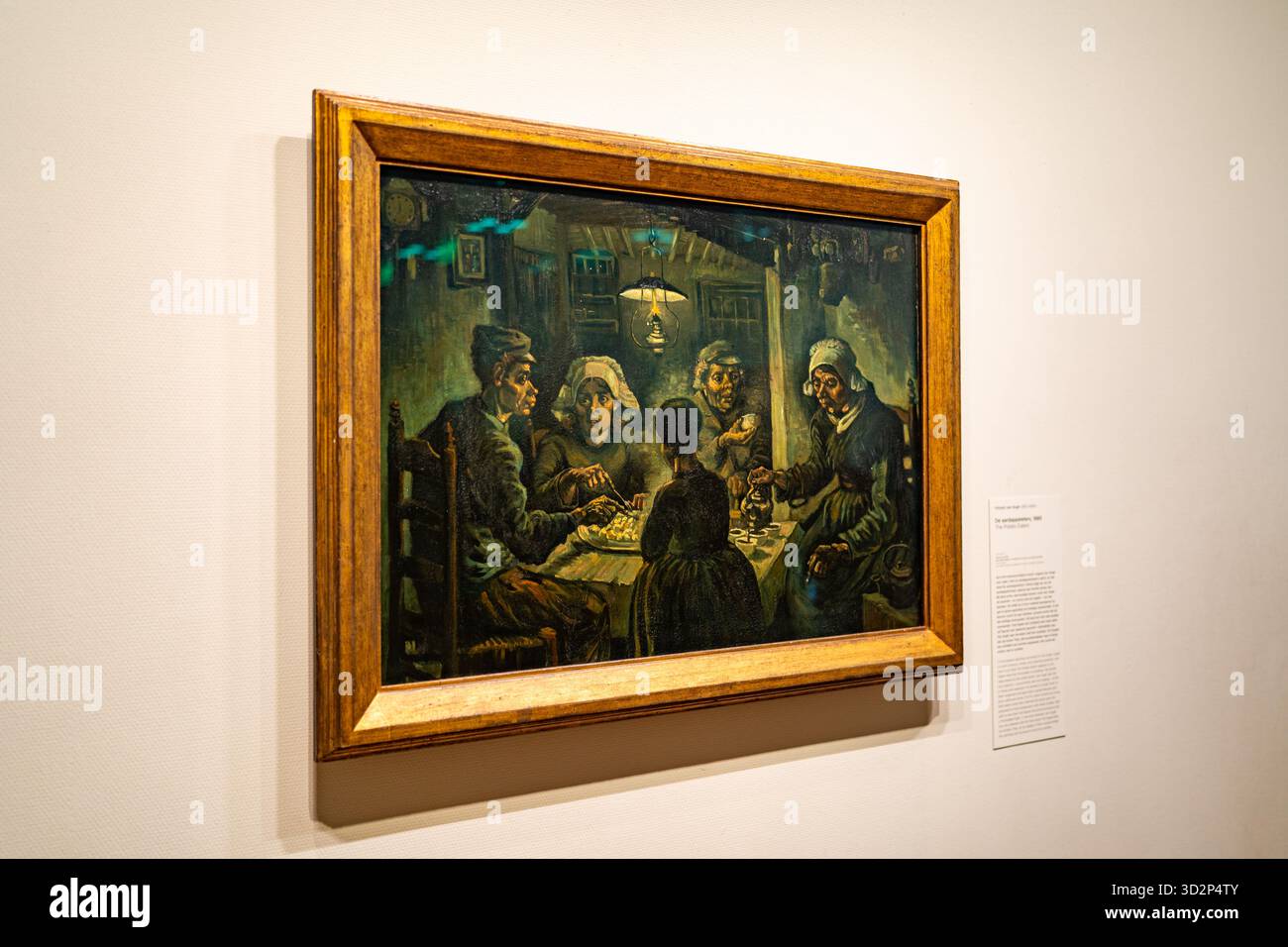 The Potato Eaters by Vincent van Gogh on display in museum Stock Photo ...