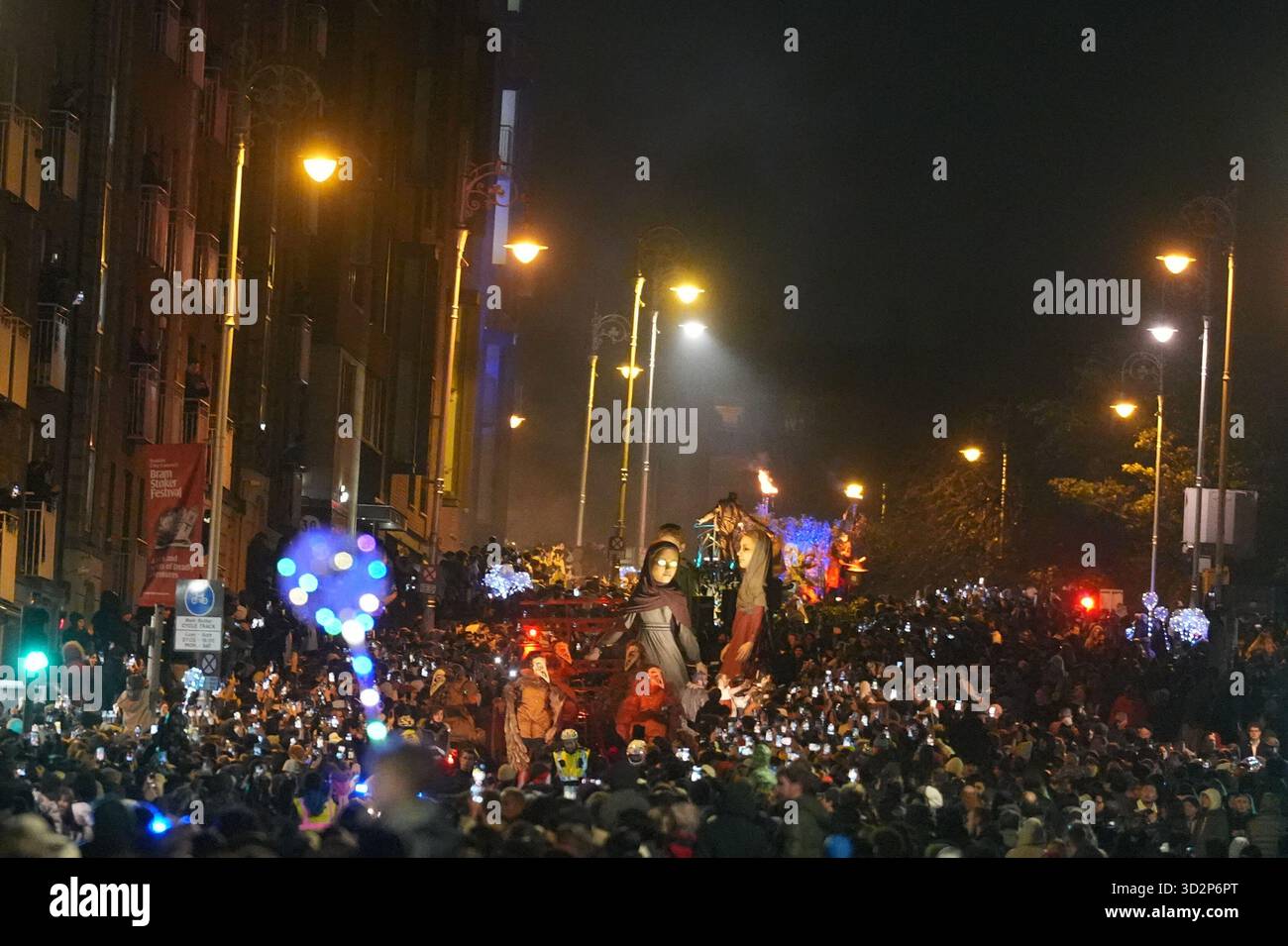 Crowds watch the Macnas Parade 'An-Treun - The Summoning of the Lost ...