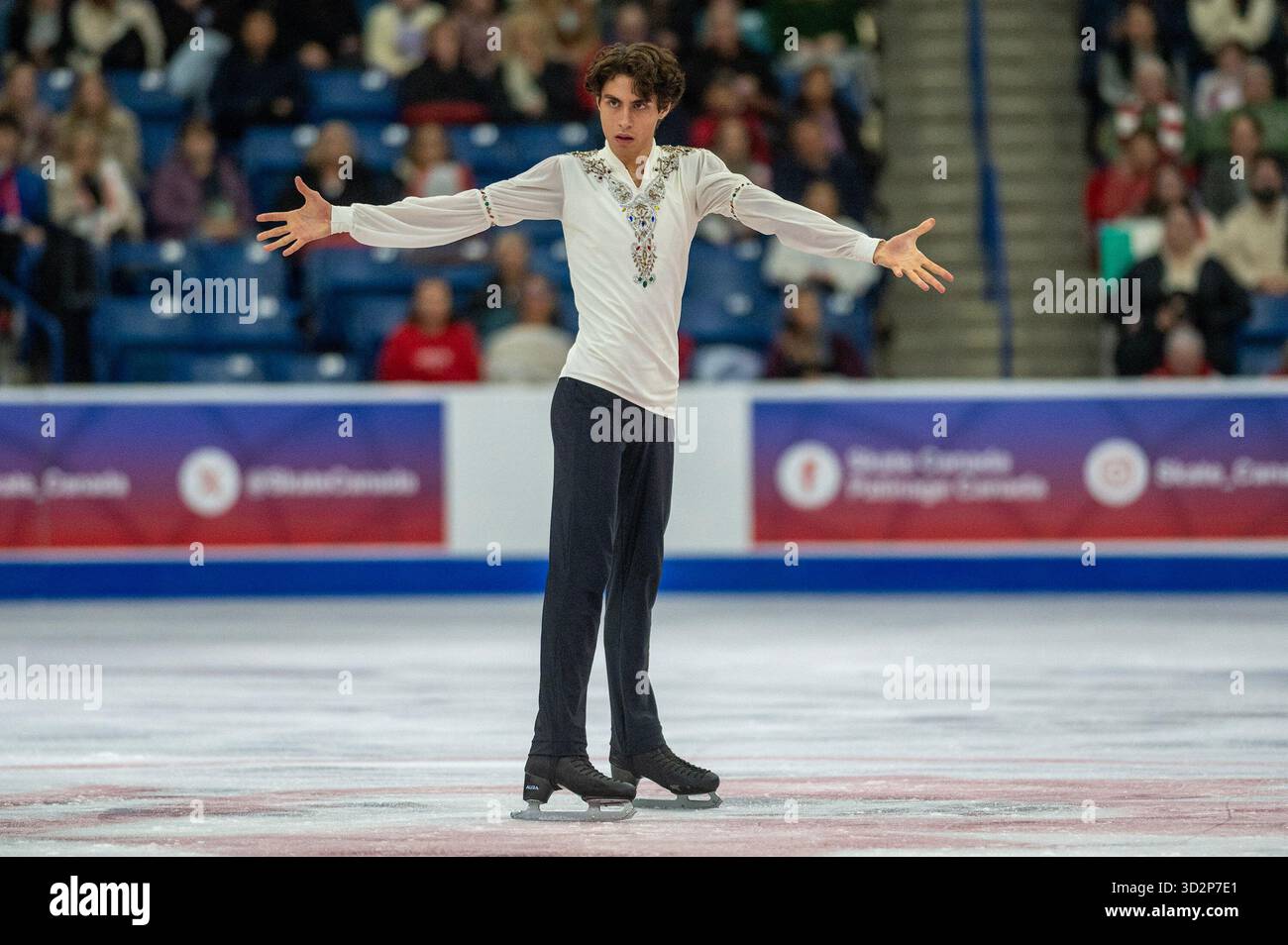 Nikolaj Memola of Italy skates in the Men‚Äôs free program competition ...