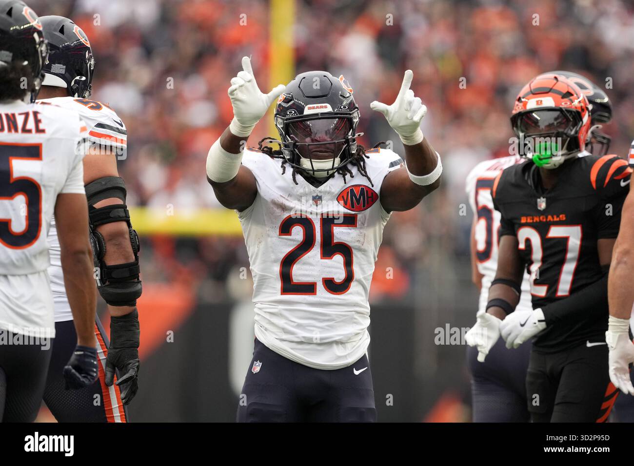 Chicago Bears running back Kyle Monangai (25) celebrates a first down ...