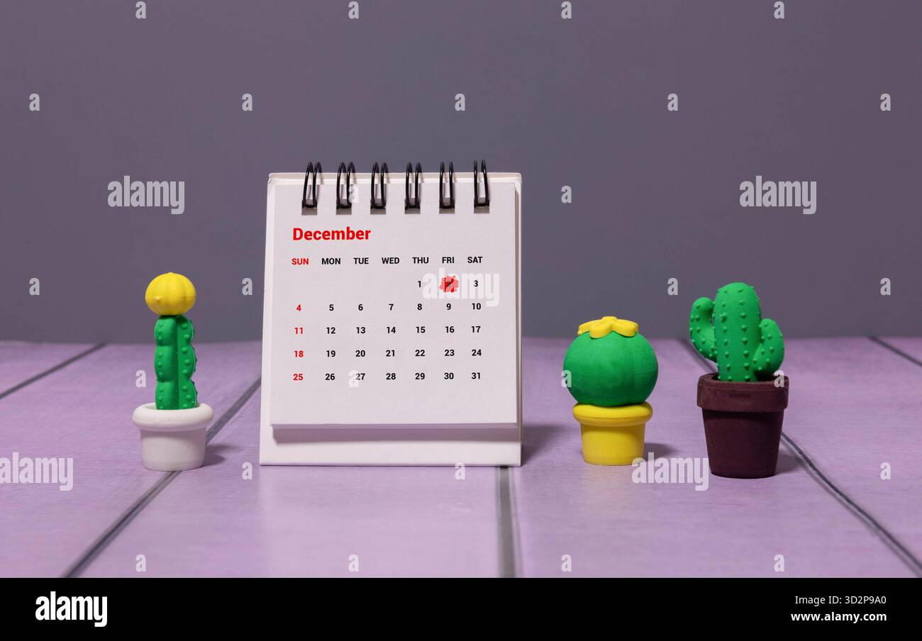 Calendar reminder event concept. Wooden cubes with numbers and month on ...