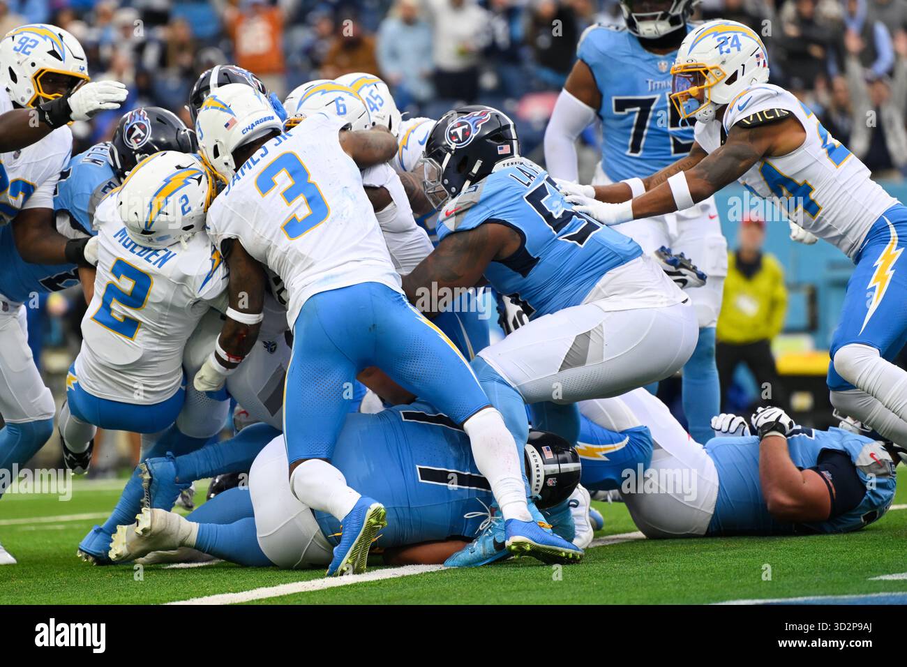 Tennessee Titans running back Tony Pollard (20) is stopped on fourth ...