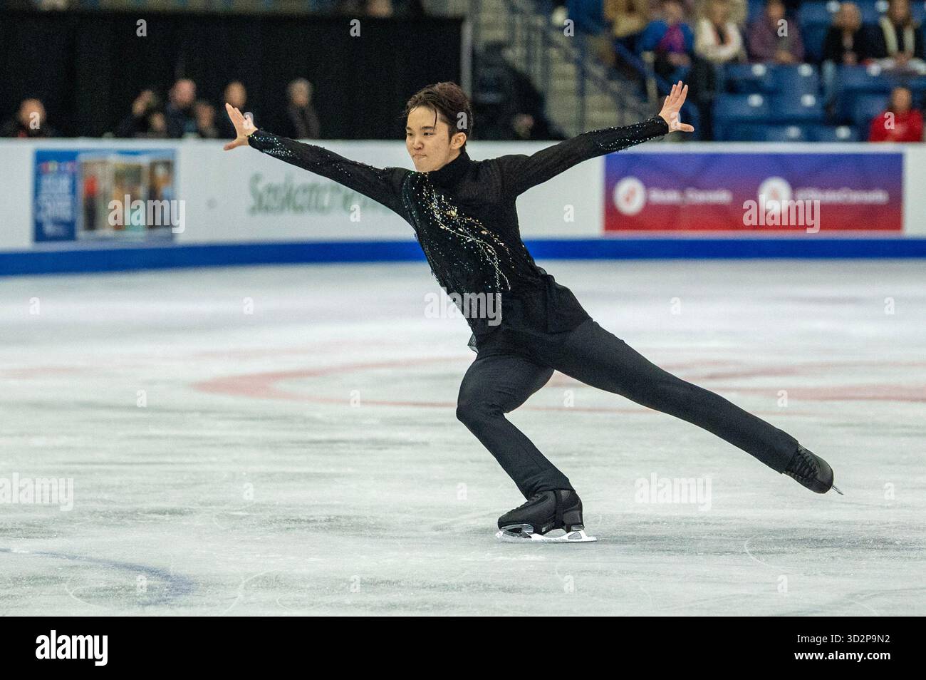 Kazuki Tomono of Japan skates in the Men‚Äôs free program competition ...