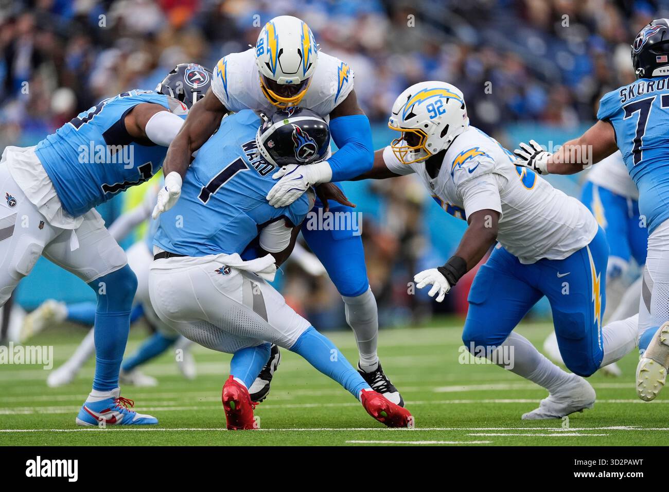 Tennessee Titans quarterback Cam Ward (1) is sacked by Los Angeles ...