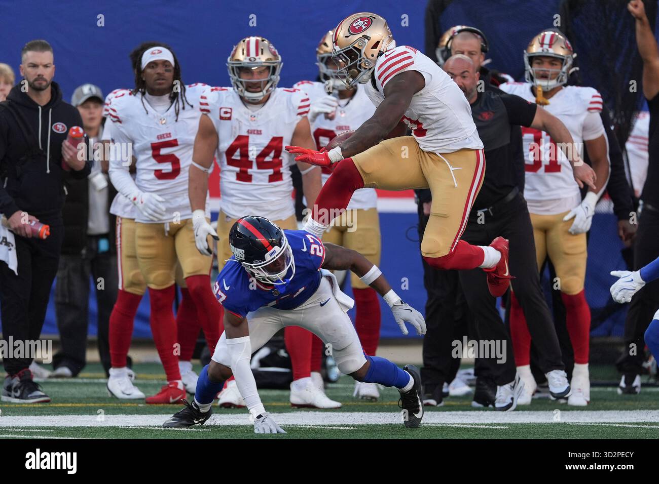 San Francisco 49ers running back Brian Robinson Jr. (3) leaps over New ...