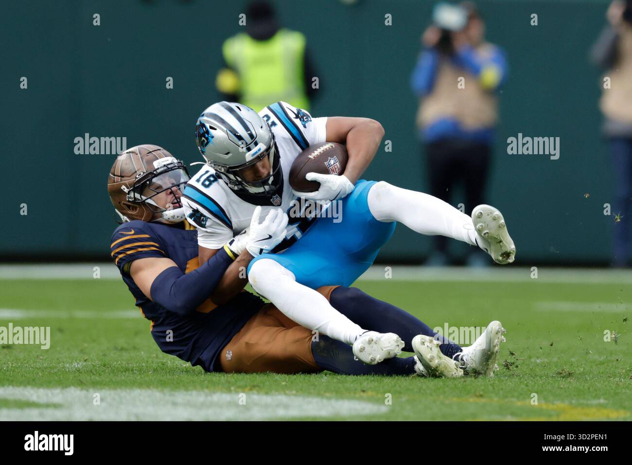 Green Bay Packers safety Evan Williams (33) tackles Carolina Panthers ...