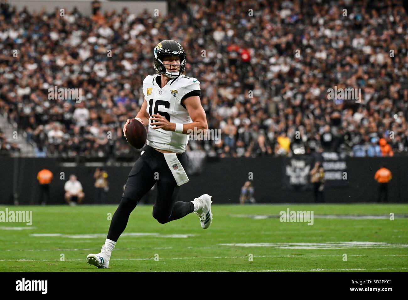 Jacksonville Jaguars quarterback Trevor Lawrence looks for an open ...