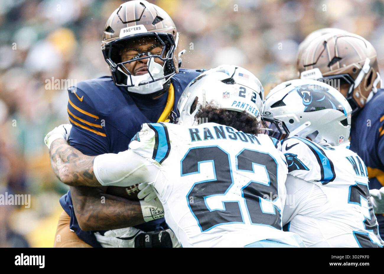 Green Bay Packers running back Chris Brooks (30) is hit by Carolina ...