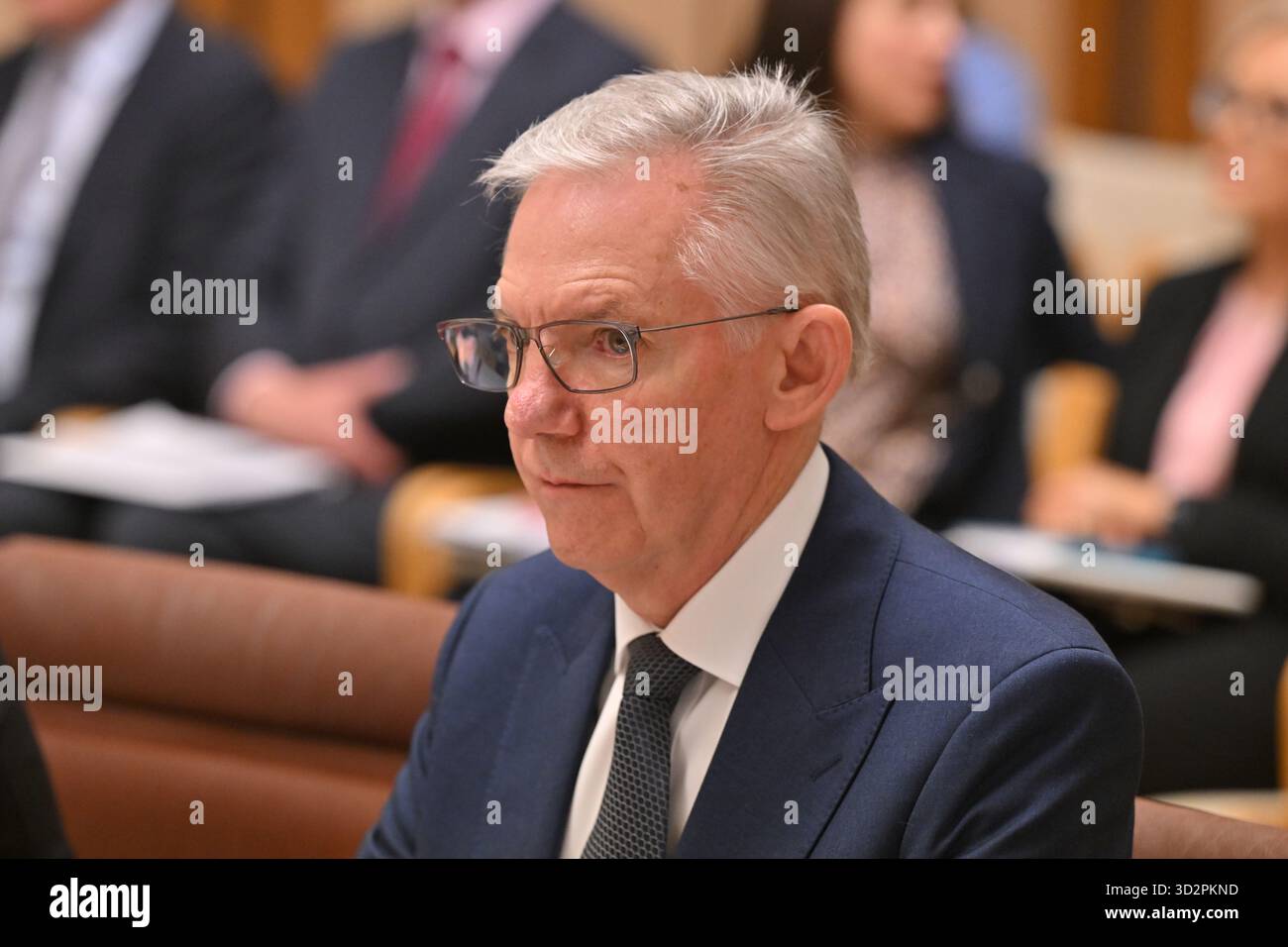 Optus Chief Financial Officer Michael Venter appears before the Triple ...
