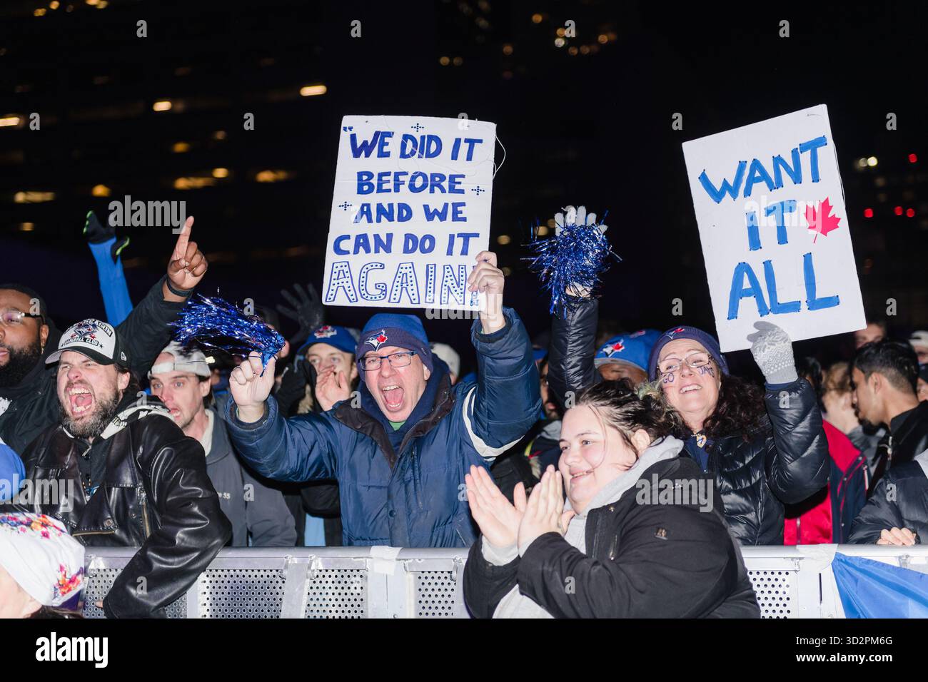 Fans hold placards outside Toronto City Hall during Game Seven of the ...