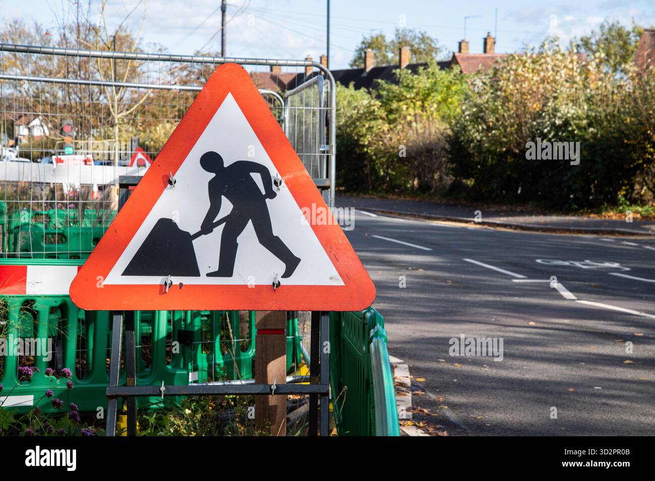 Triangle roadworks sign warning drivers of ongoing construction ...