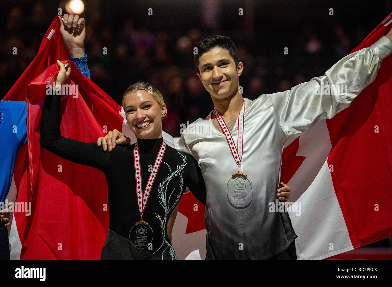 Marjorie Lajoie and Zachary Lagha of Canada, are shown with their ...