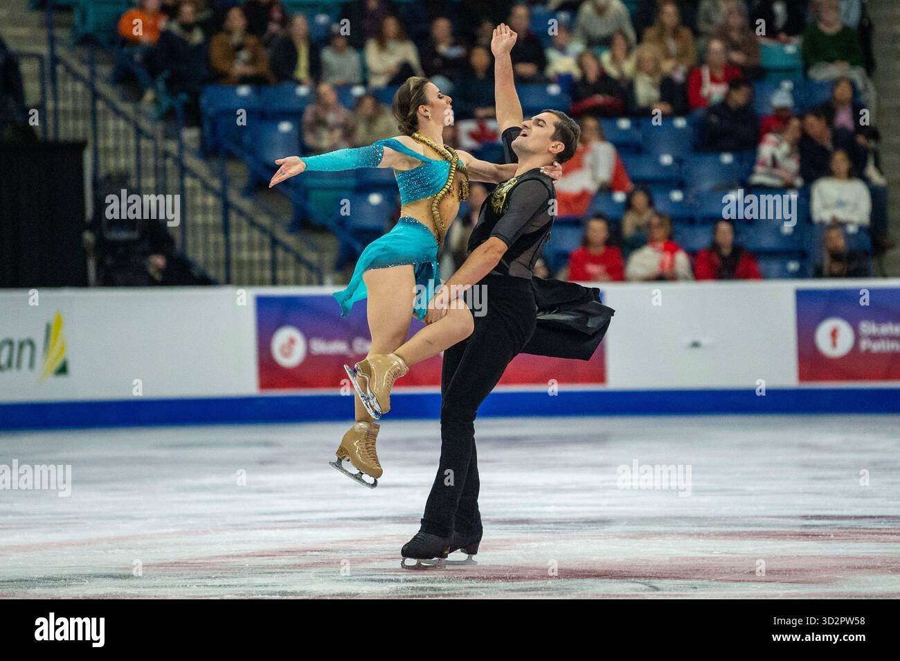 Marie-Jade Lauriault and Romain Le Gac, of Canada, skate in the Dance free program competition ...