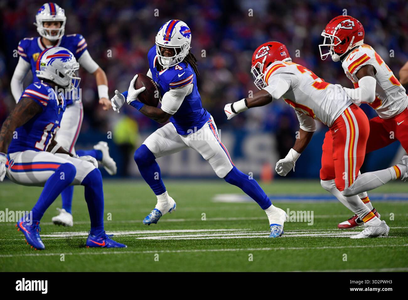 Buffalo Bills running back James Cook III (4) runs with the ball during ...