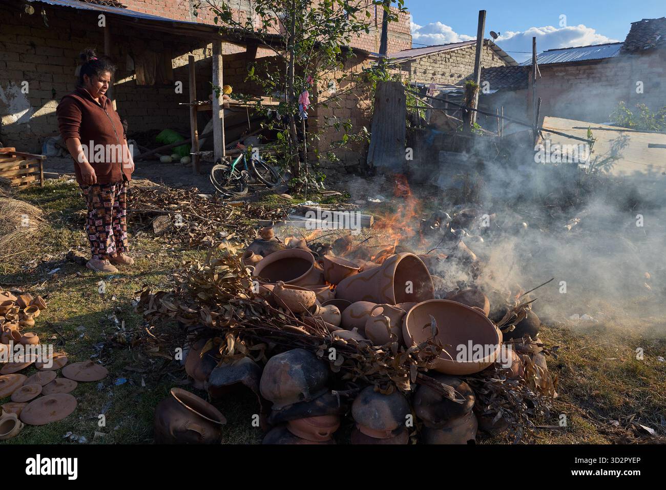 the firing process of clay pottery in Huancas brings earth to life ...
