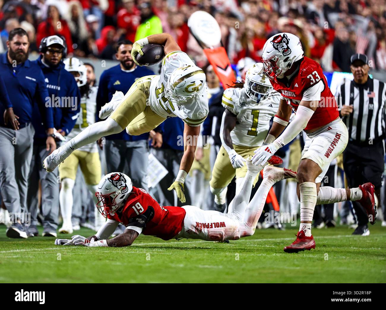 November 1, 2025: NC State saftey Tristan Teasdell (19) hits Georgia ...