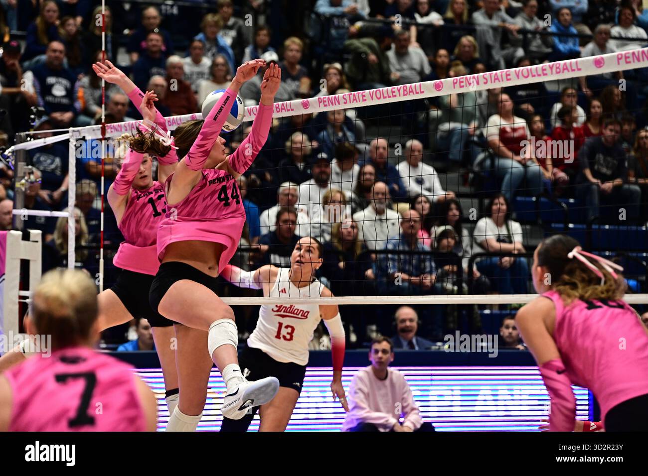Penn State's middle blocker Maggie Mendelson (44) attempts a block ...