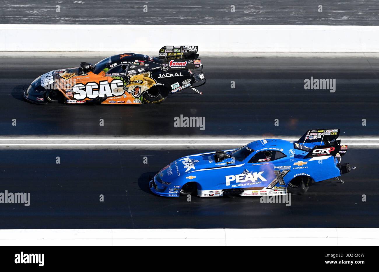 LAS VEGAS, NV - NOVEMBER 02: Funny Car drivers Daniel Wilkerson, far ...