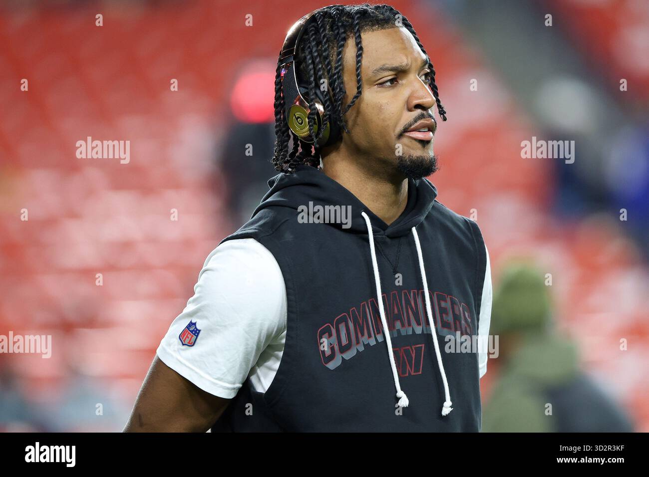 Washington Commanders quarterback Jayden Daniels (5)looks on before an ...