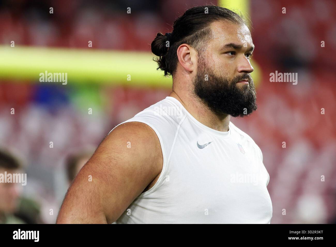 Washington Commanders guard Sam Cosmi (76) looks on before an NFL ...