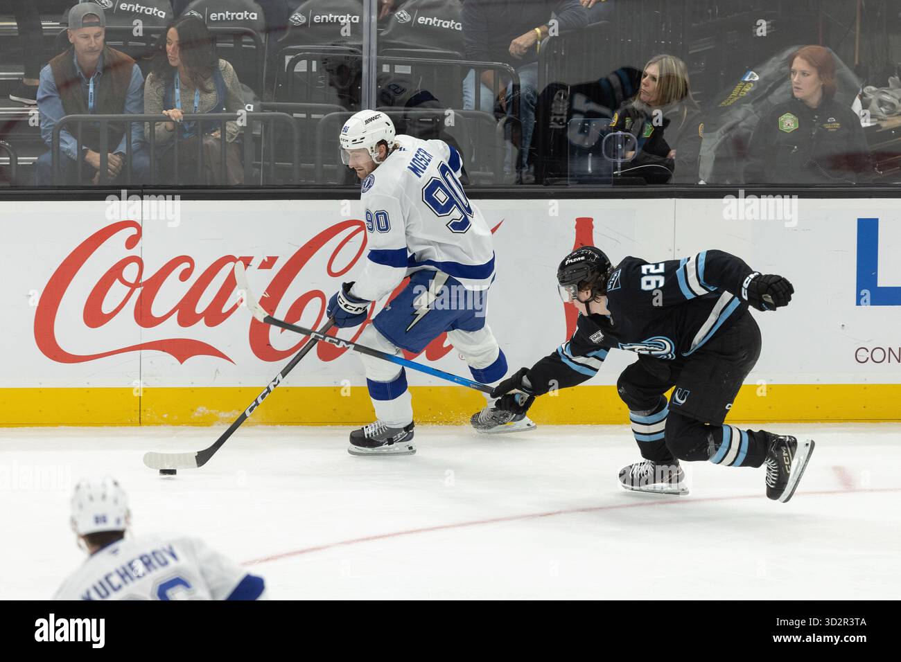 Tampa Bay Lightning defenseman J.J. Moser (90) moves the puck against ...