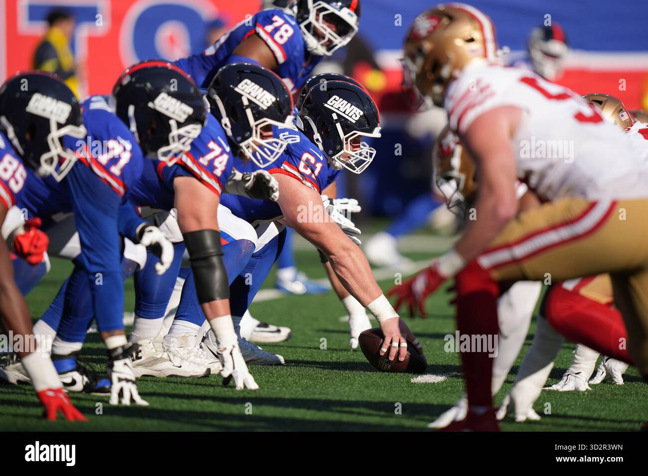 New York Giants center John Michael Schmitz (61) prepares to snap the ...