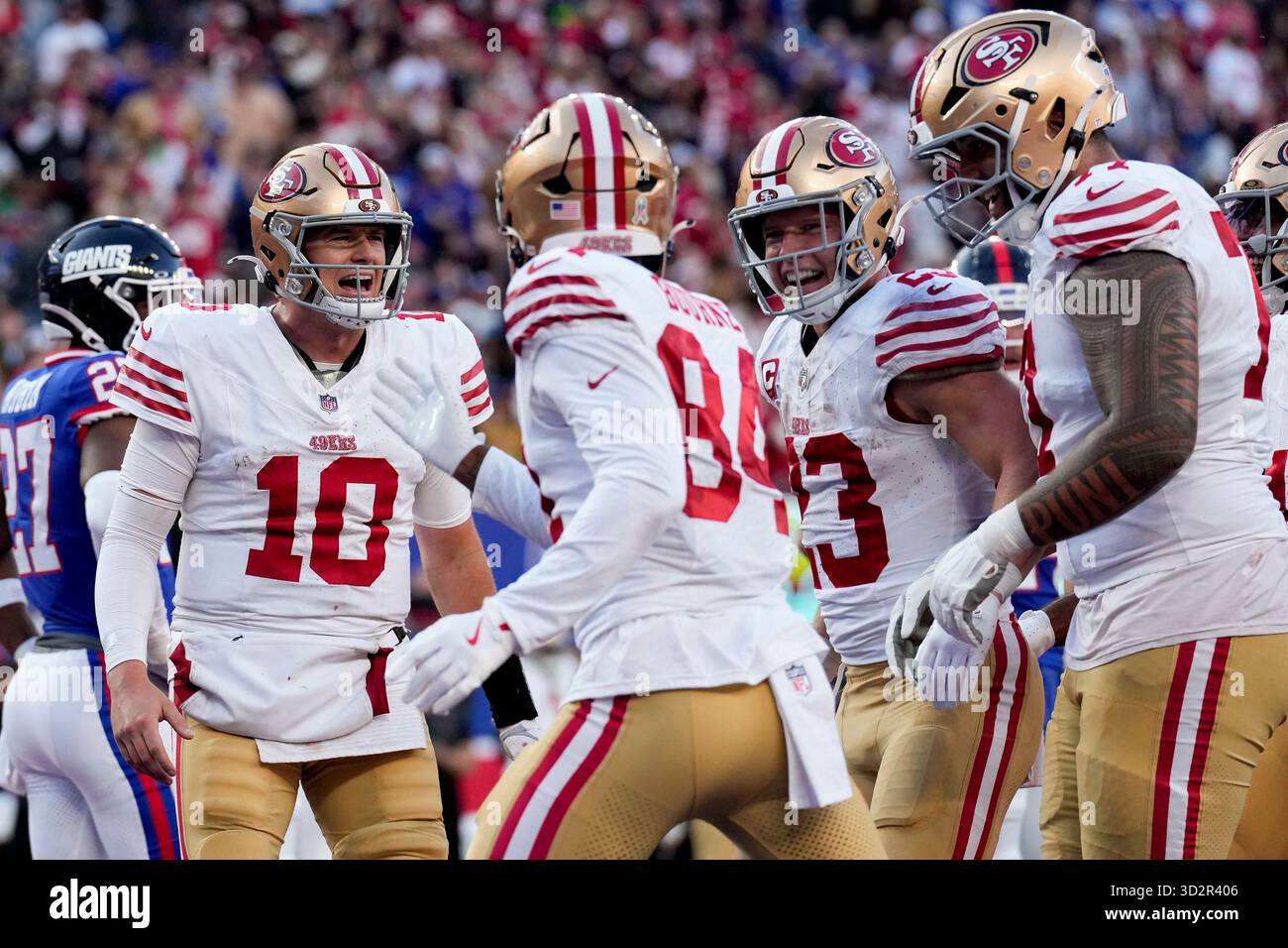 San Francisco 49ers quarterback Mac Jones (10) reacts after a touchdown ...
