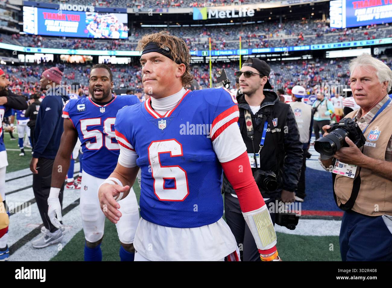 New York Giants quarterback Jaxson Dart (6) walks off the field after ...