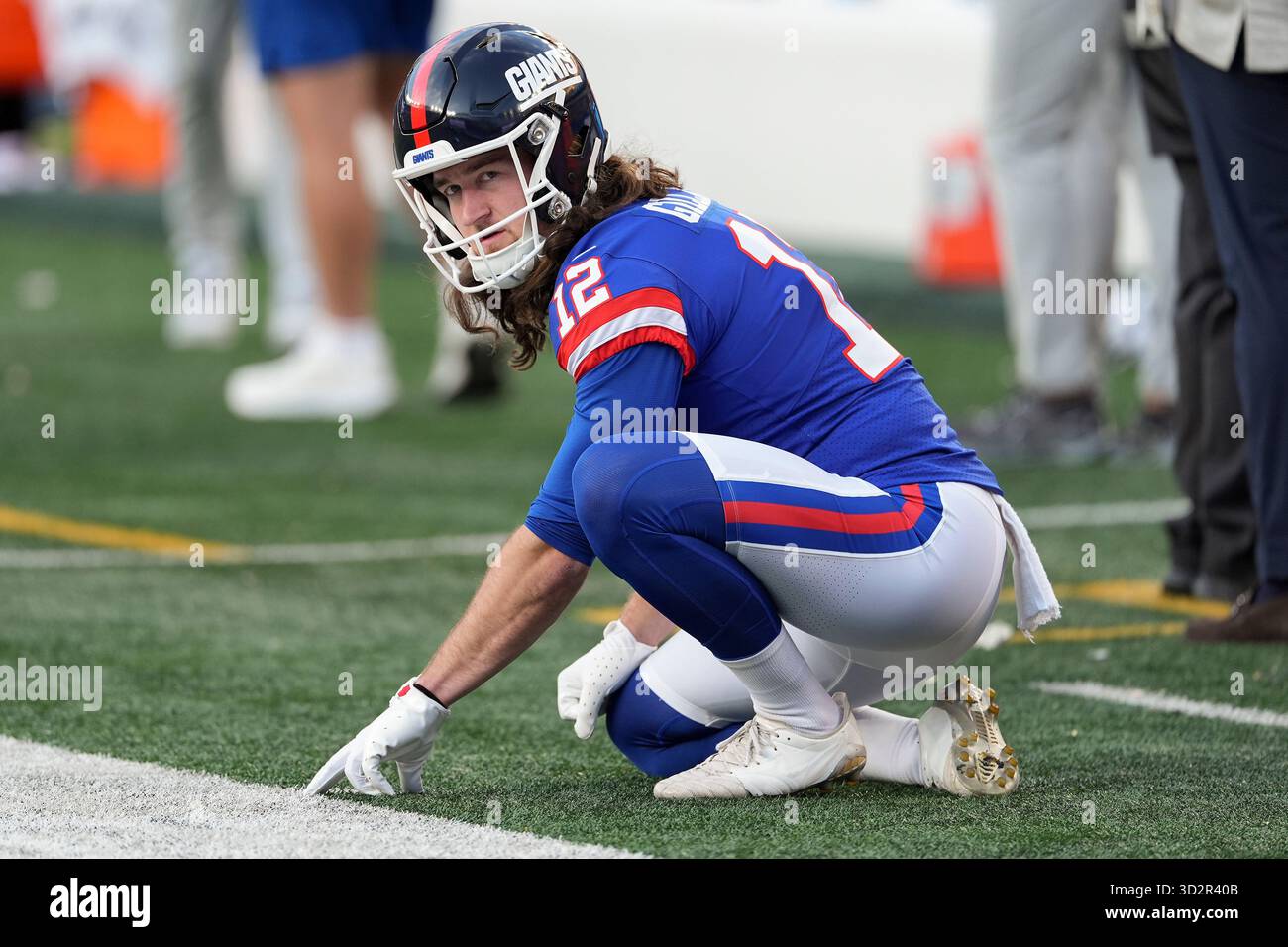 New York Giants punter Jamie Gillan (12) on the sidelines before an NFL ...