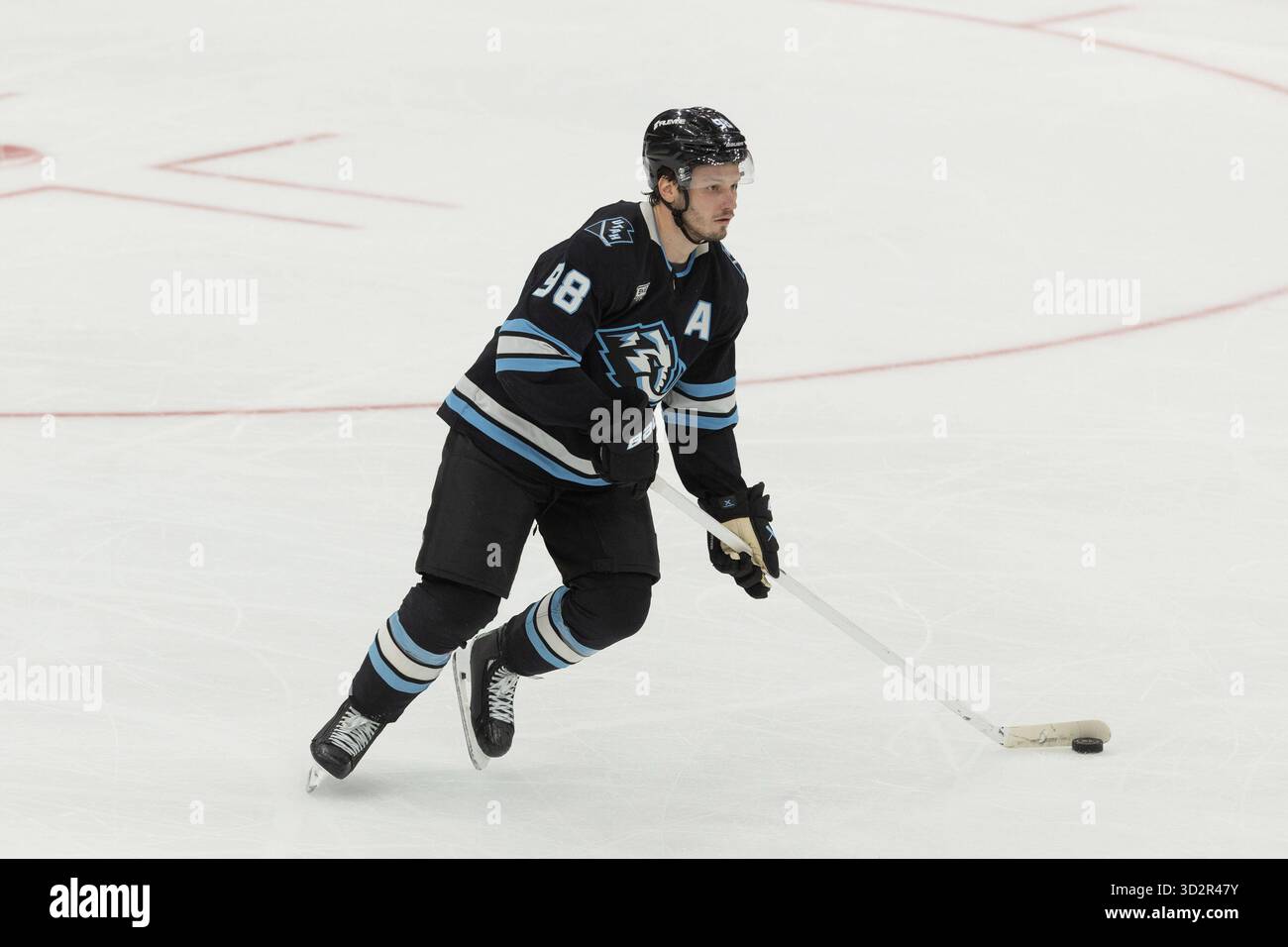 Utah Mammoth defenseman Mikhail Sergachev (98) moves the puck on the ...