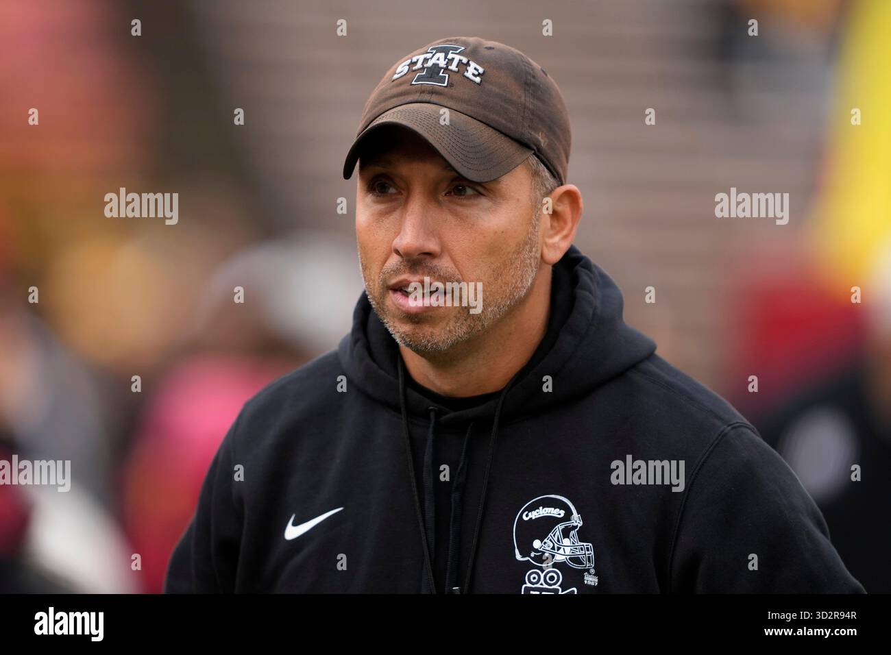 Iowa State head coach Matt Campbell walks on the field before an NCAA ...