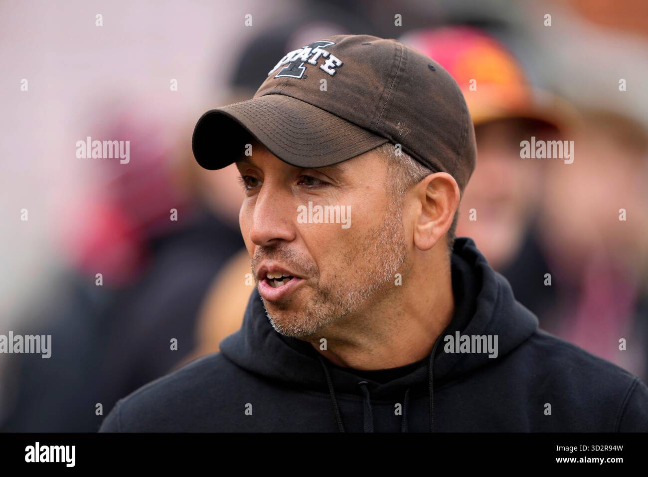 Iowa State head coach Matt Campbell walks on the field before an NCAA ...