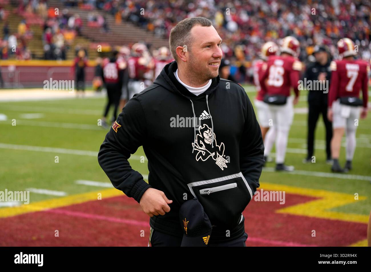 Arizona State head coach Kenny Dillingham walks on the field before an ...