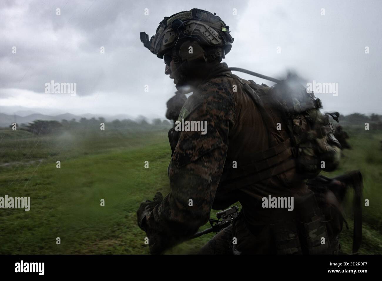 U.S. Marine Corps Cpl. Adrian Alaniz, a machine gunner with Weapons ...