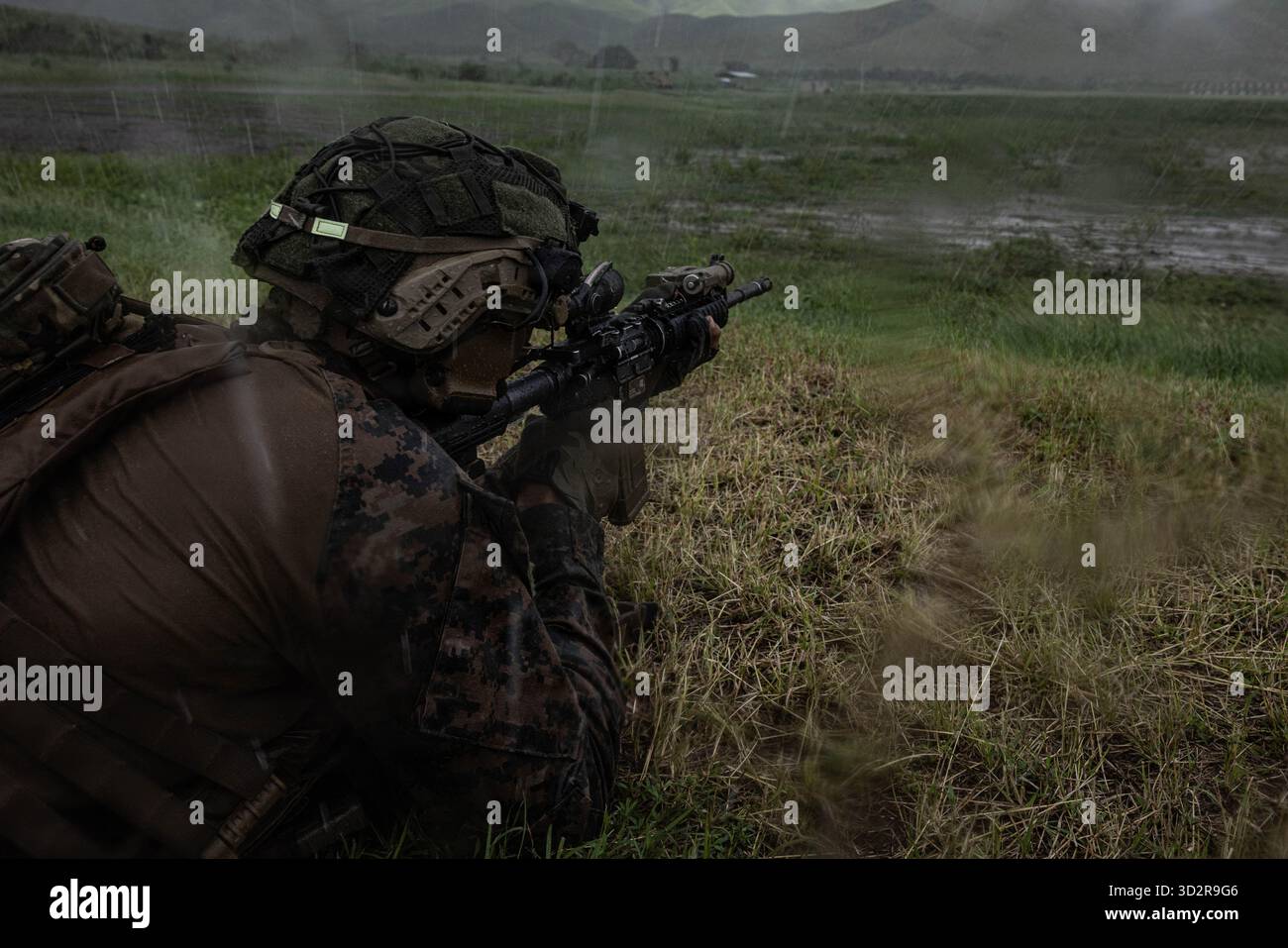 U.S. Marine Corps Cpl. Adrian Alaniz, a machine gunner with Weapons ...