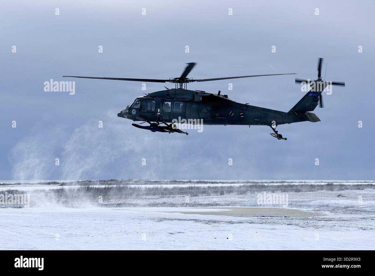 An Alaska Army National Guard UH-60L Black Hawk helicopter, assigned to ...