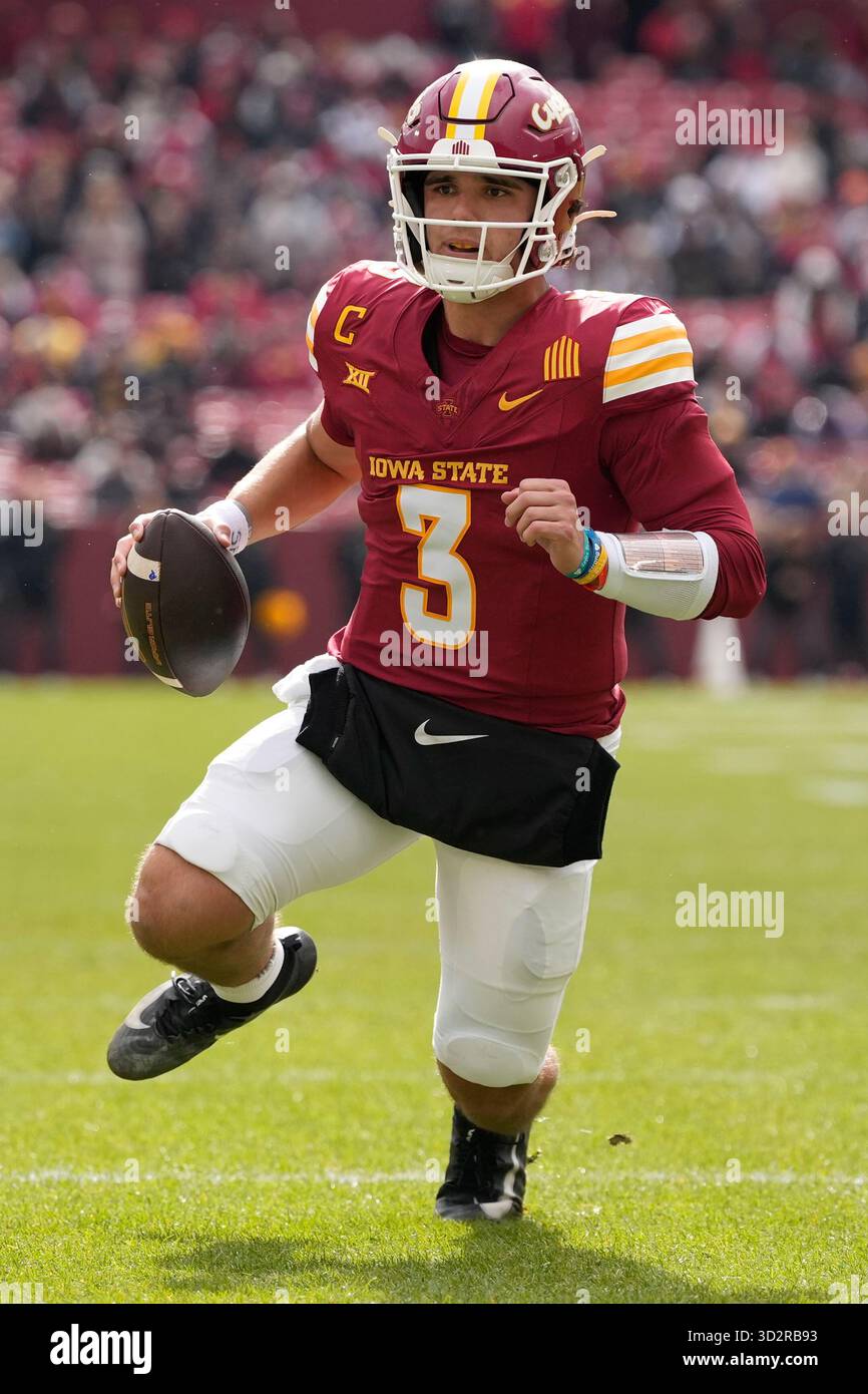 Iowa State quarterback Rocco Becht scrambles up field during the first ...