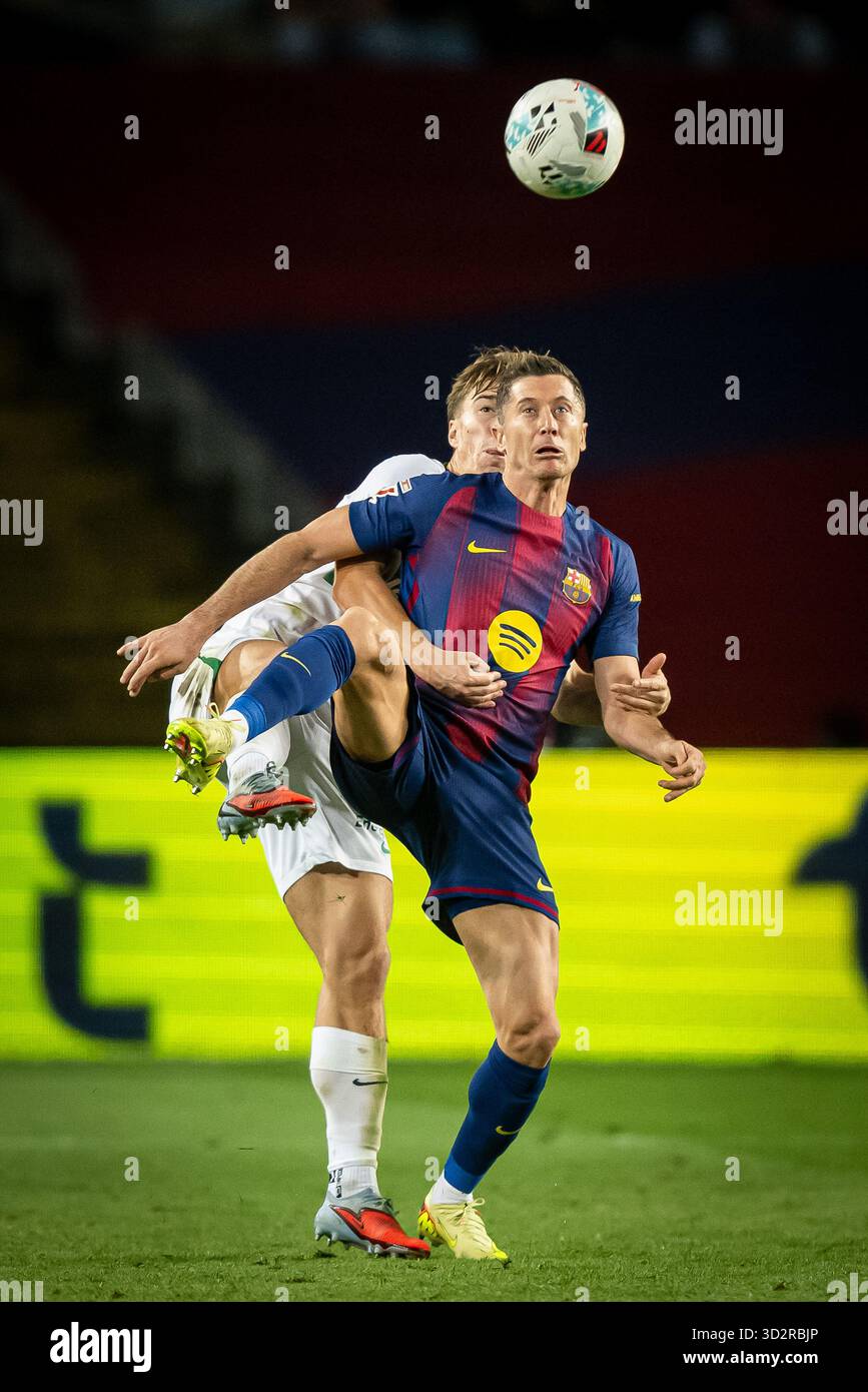 David Affengruber (Elche CF) and Robert Lewandowski (FC Barcelona) seen ...