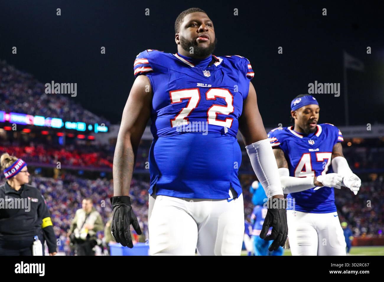 Buffalo Bills defensive tackle Phidarian Mathis (72) walks off the ...