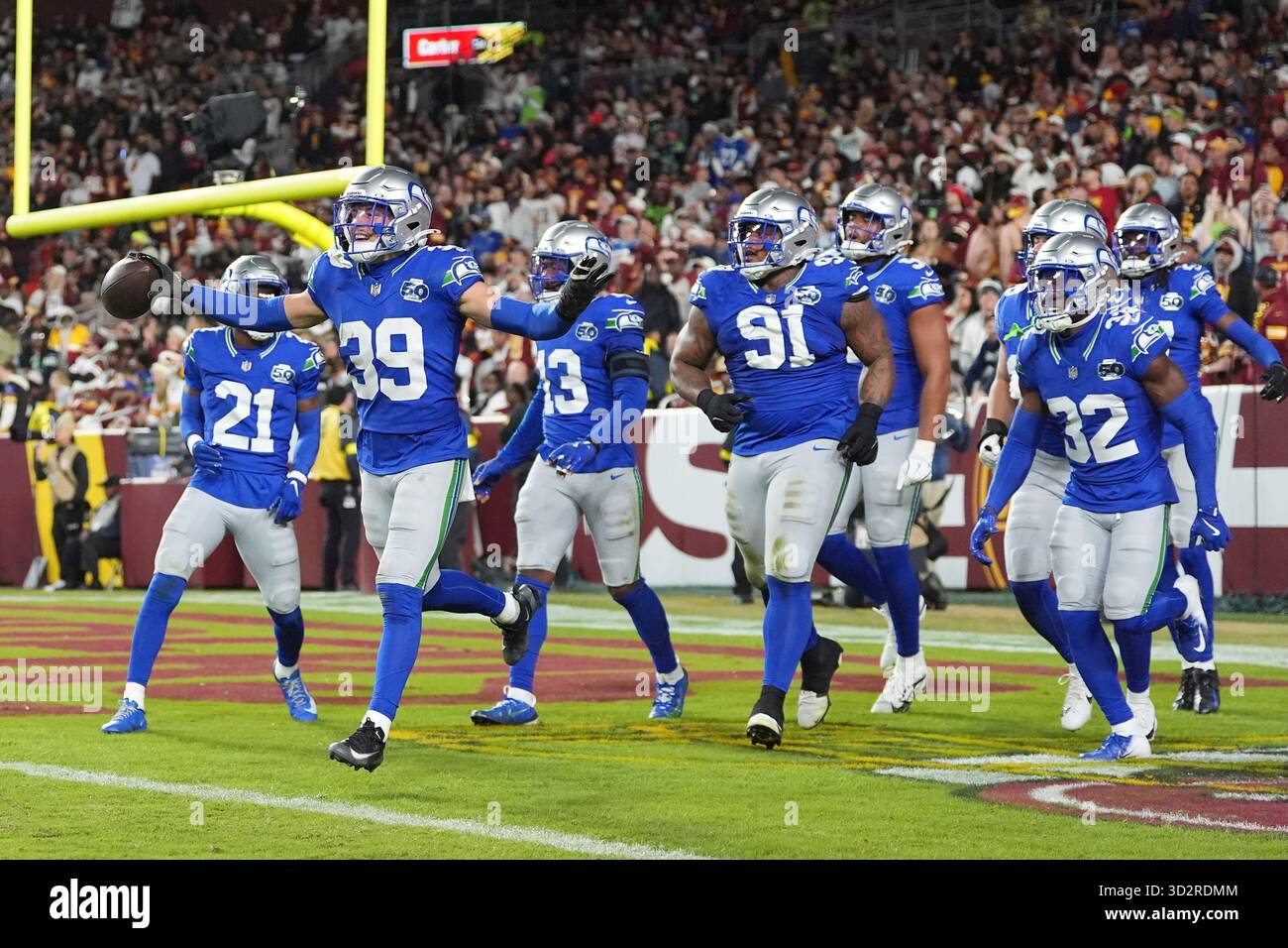 Seattle Seahawks safety Ty Okada (39) celebrating his interception with ...