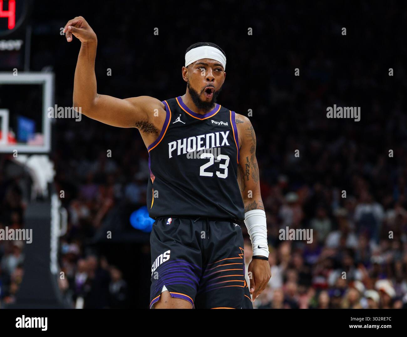 Phoenix Suns guard Jordan Goodwin celebrates after a 3-point basket ...