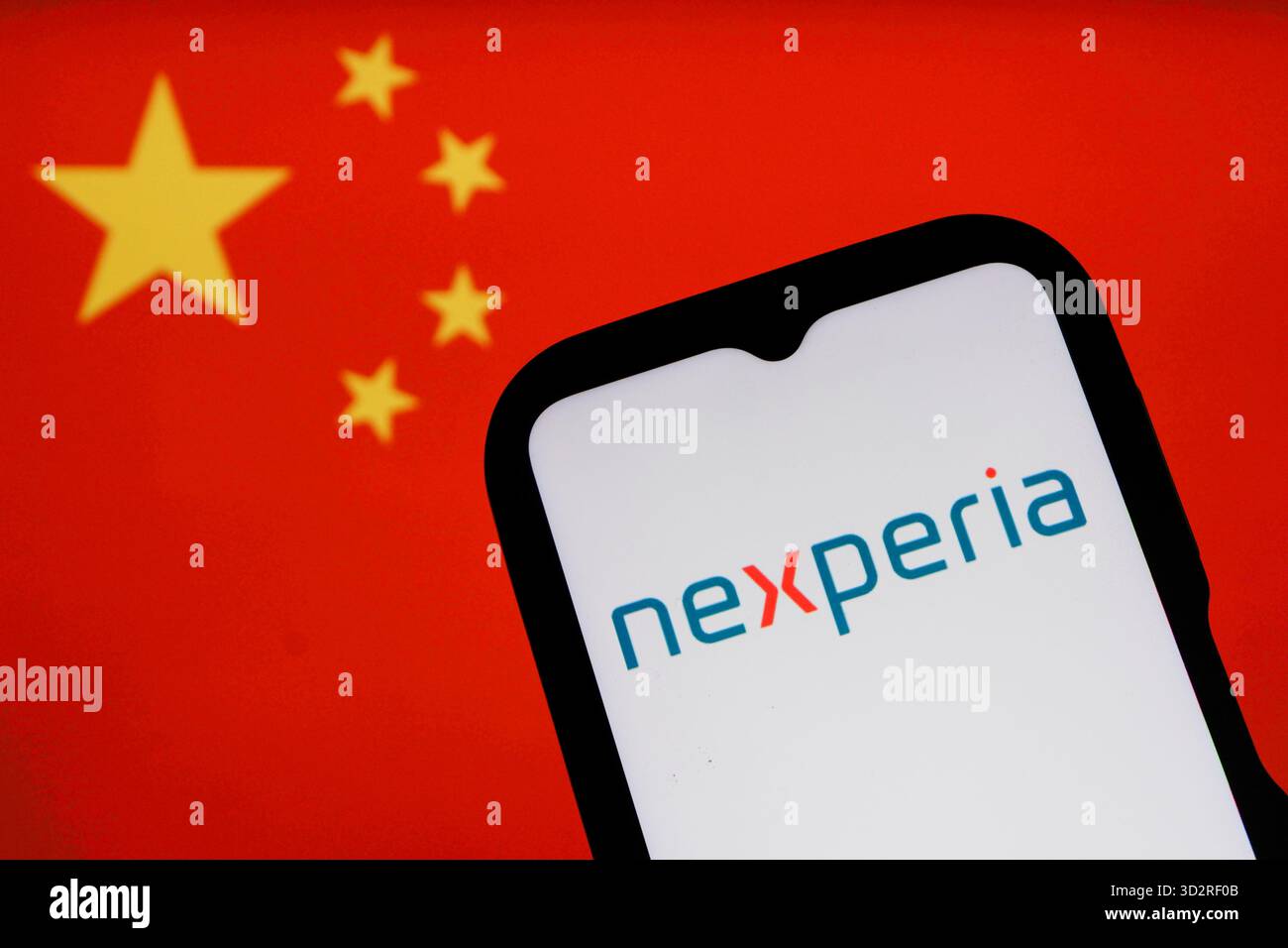 In this photo illustration, a Nexperia logo is displayed on a ...