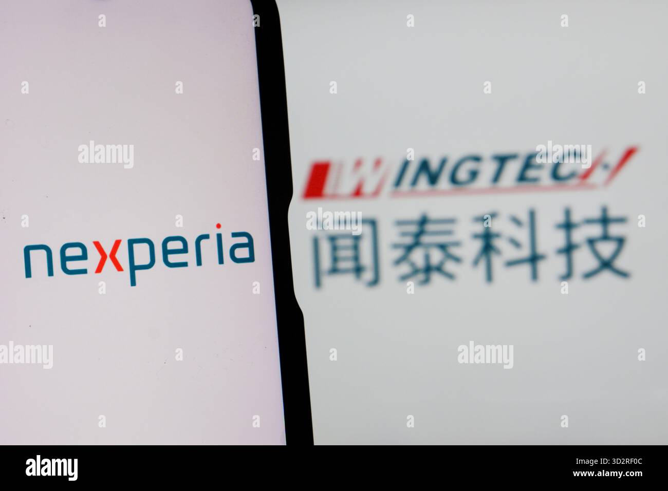 In this photo illustration, a Nexperia logo is displayed on a ...