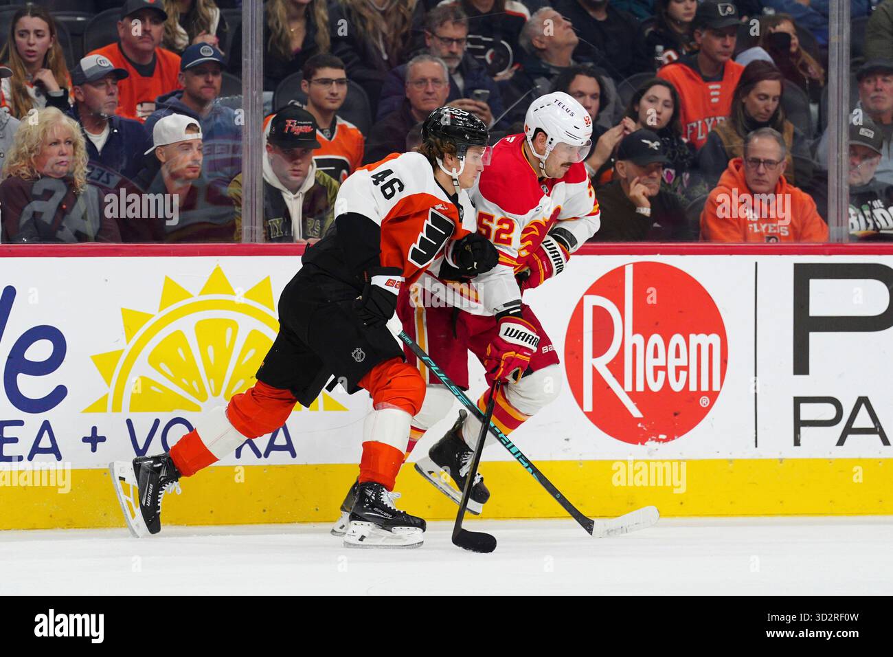 Philadelphia Flyers' Trevor Zegras (46) and Calgary Flames' Mackenzie ...