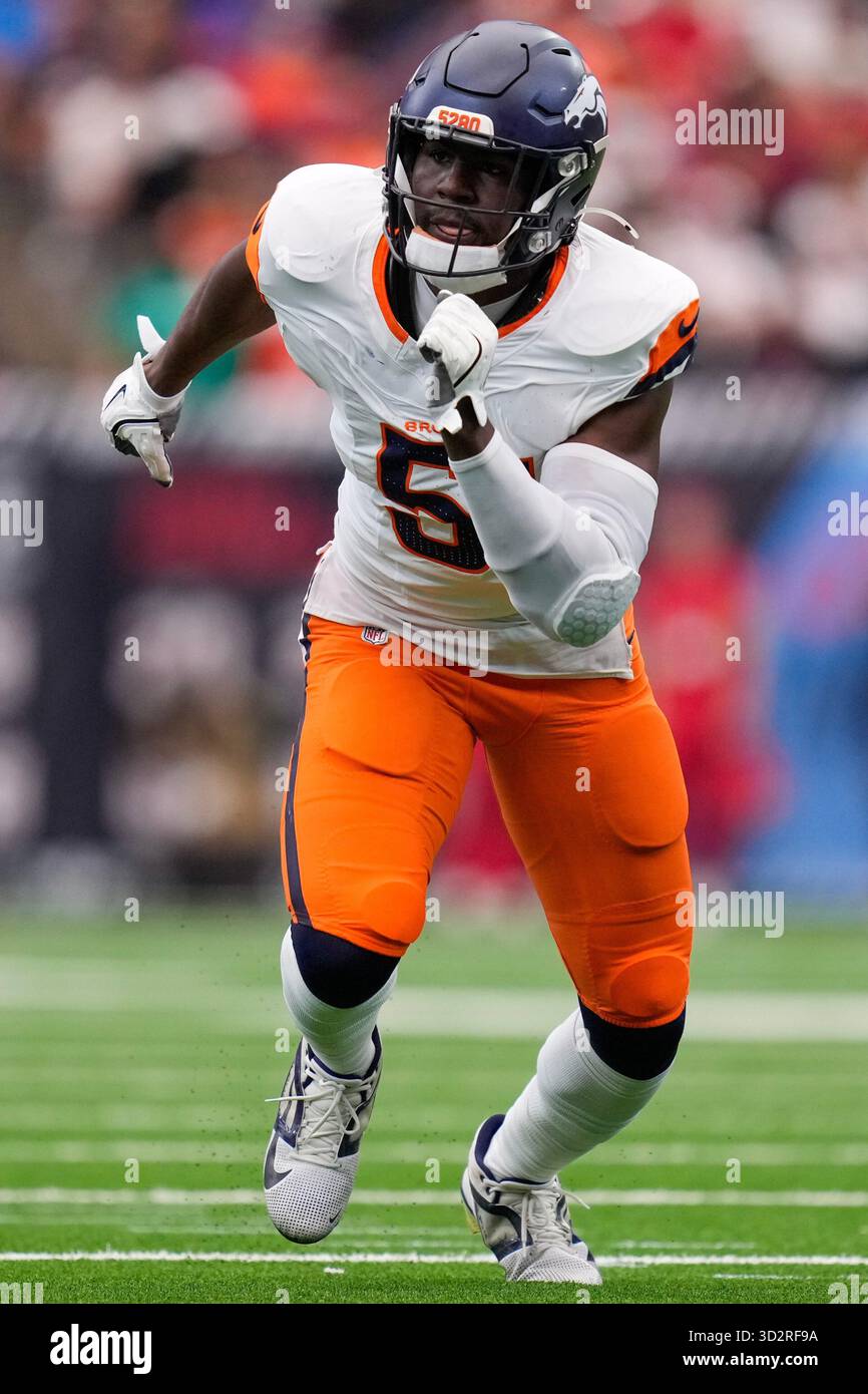 Denver Broncos linebacker Que Robinson (51) plays against the Houston ...