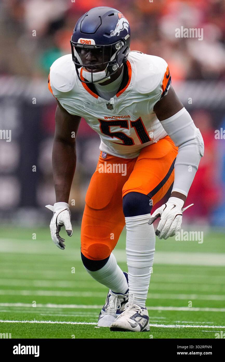 Denver Broncos linebacker Que Robinson (51) plays against the Houston ...