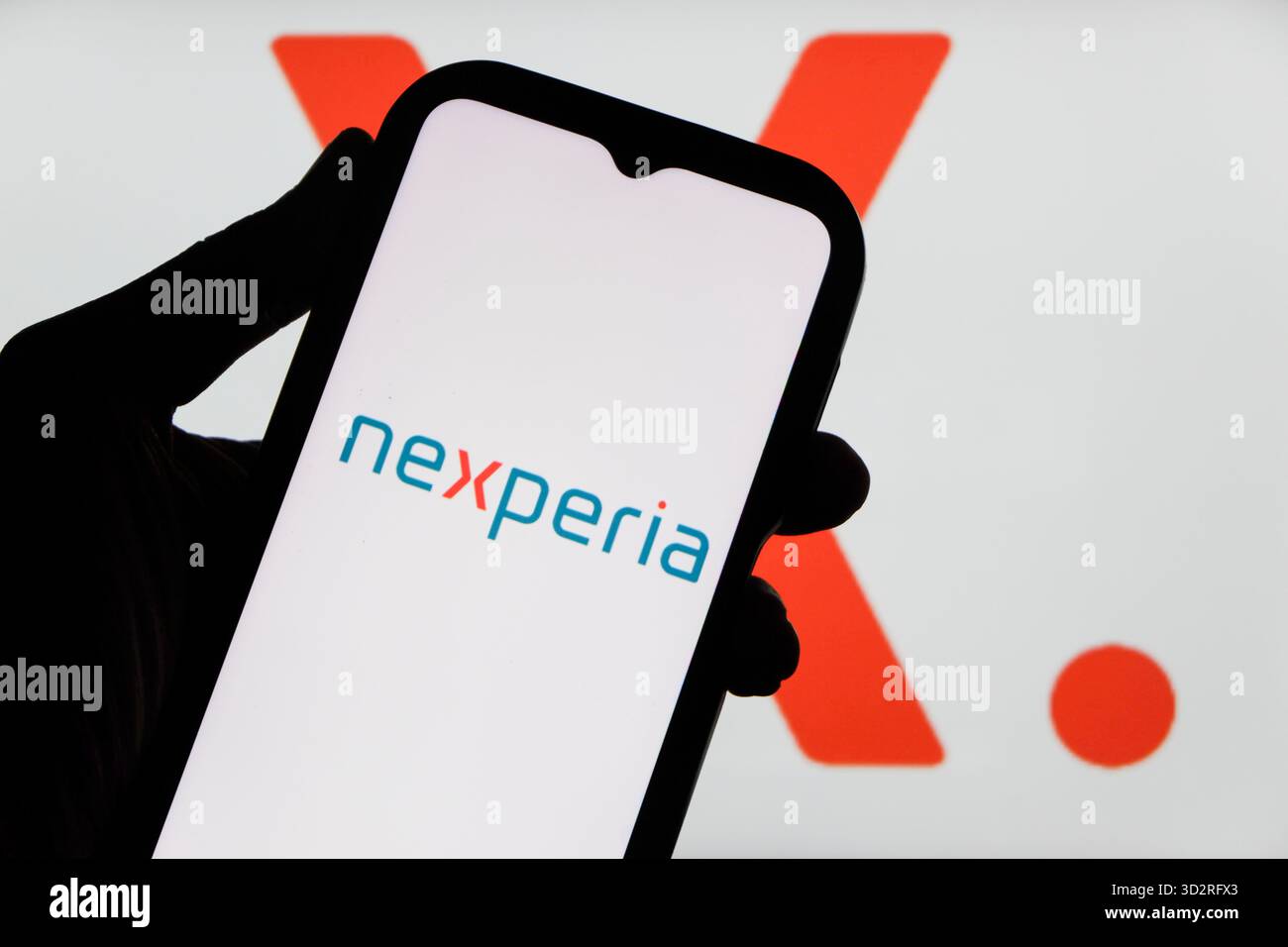 In this photo illustration, a Nexperia logo is displayed on a ...