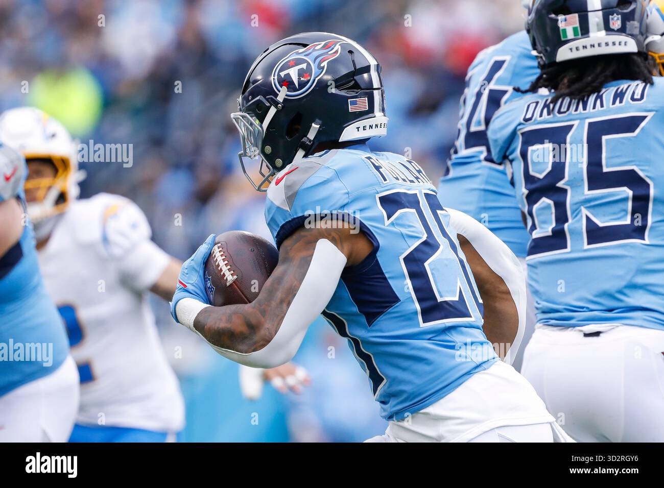 Tennessee Titans running back Tony Pollard (20) runs with the ball ...